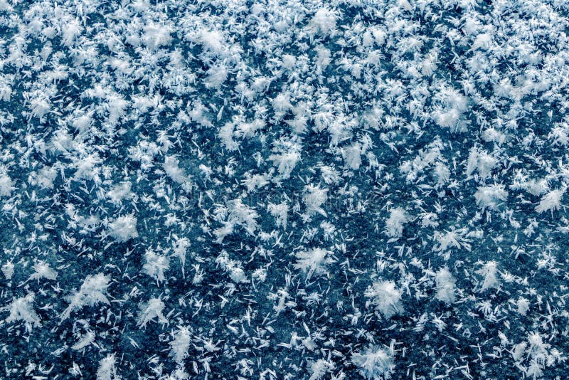 Big Fluffy Snowflakes on the Surface of the Ice. Winter and Christmas ...