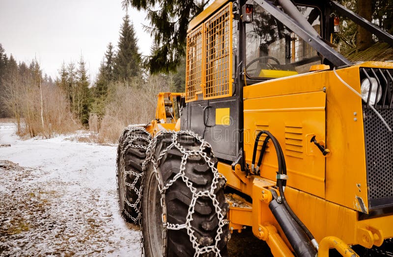 Big Forest Vehicle with Snow Chains on the Wheels Stock Photo - Image ...