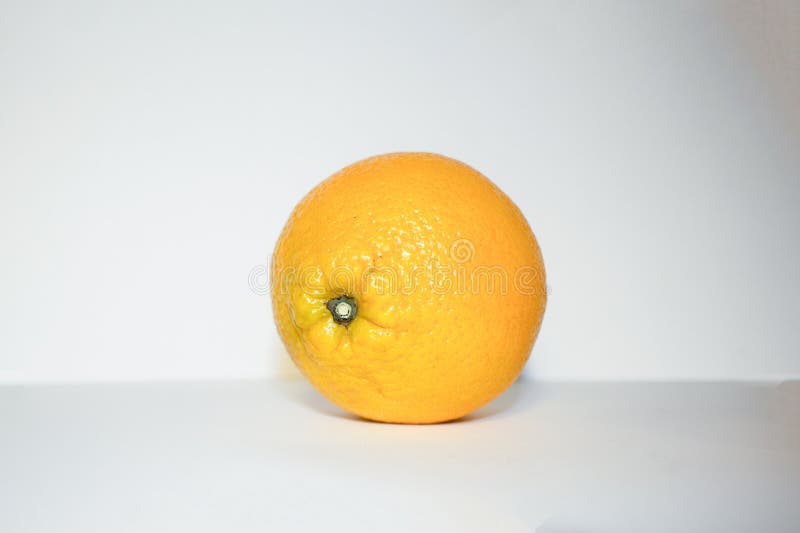 Big Fresh Single Orange Fruit Lying on a White Table Stock Image ...