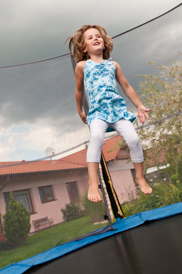 Joy - jumping trampoline stock photo. Image of child - 84569296
