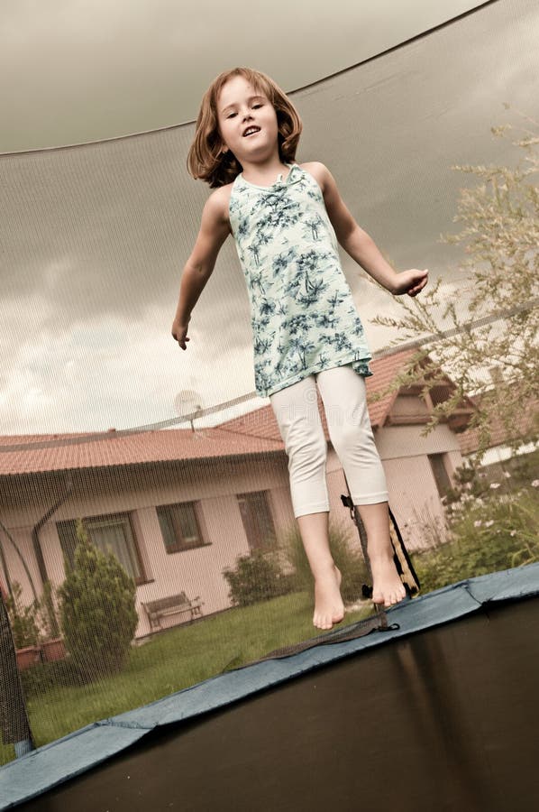 Big Fun - Child Jumping Trampoline Stock Image - Image of childhood ...