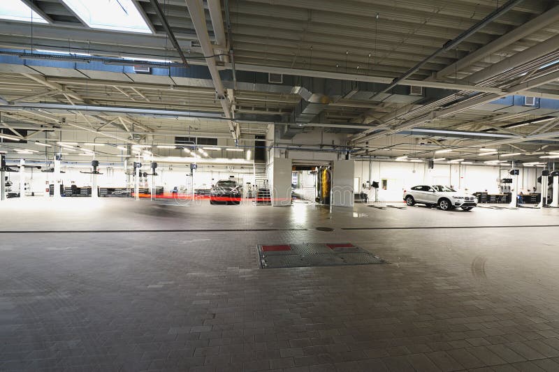 Big garage with cars stock image. Image of automobile - 63843621
