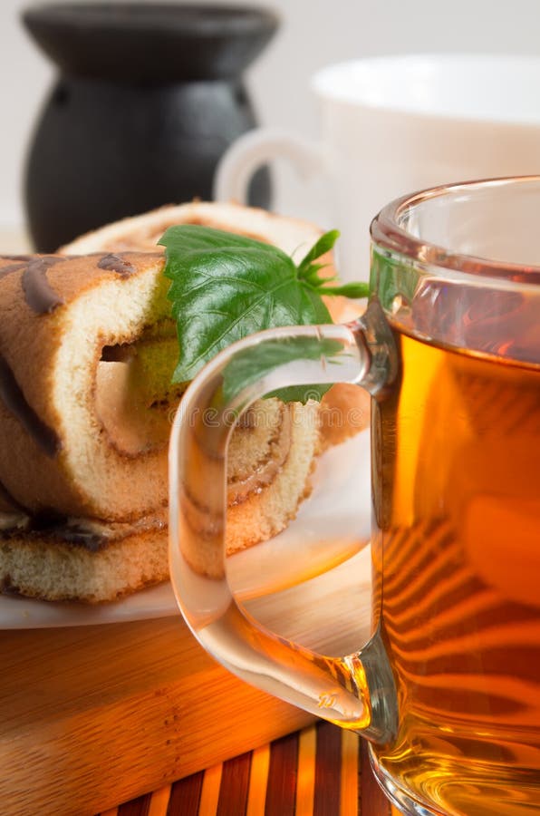 Big Glass Mug of Tea and Chocolate Cake Close-up Stock Image - Image of ...