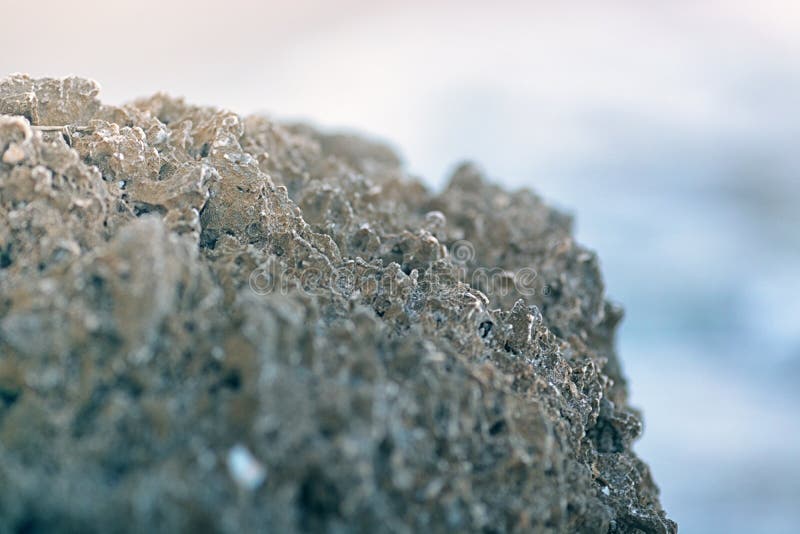 Big gray rocks at a beach stock image. Image of black - 127329619