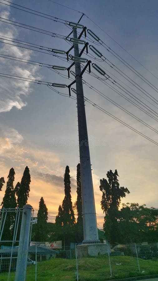 A Big Great Electricity Power Pole and the Beautiful Afternoon Sky ...