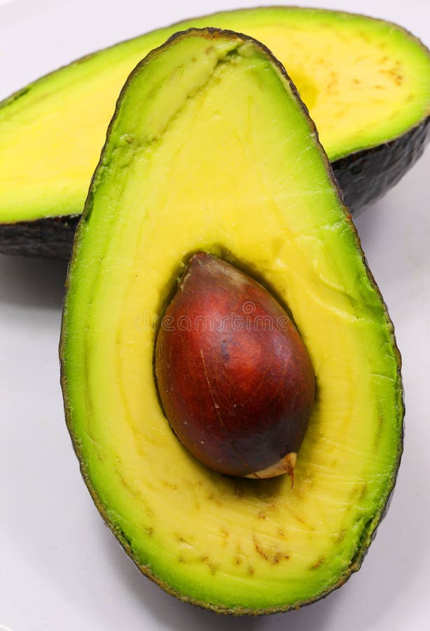 Big Green Avocado Seed from a Ripe Tropical Fruit Cut in Half Stock ...