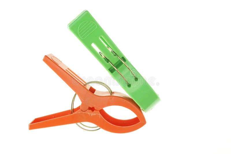Big Green and Orange Clothes Pegs Isolated Stock Photo - Image of ...