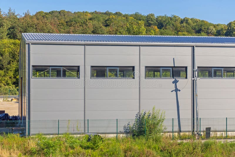 Big Warehouse Building stock photo. Image of fence, industrial - 230187556