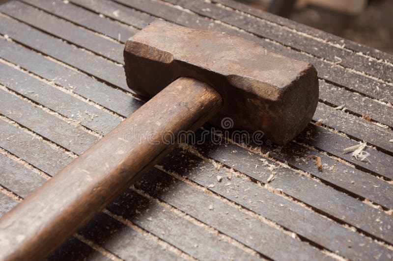 Big Hammer on Iron Table with Wooden Dust Stock Image - Image of ...