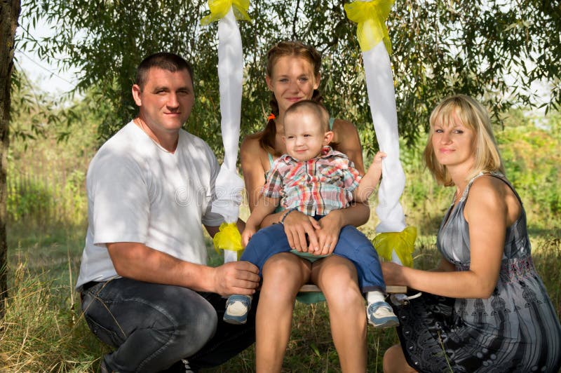 Big happy family rest stock image. Image of grass, love - 34744501