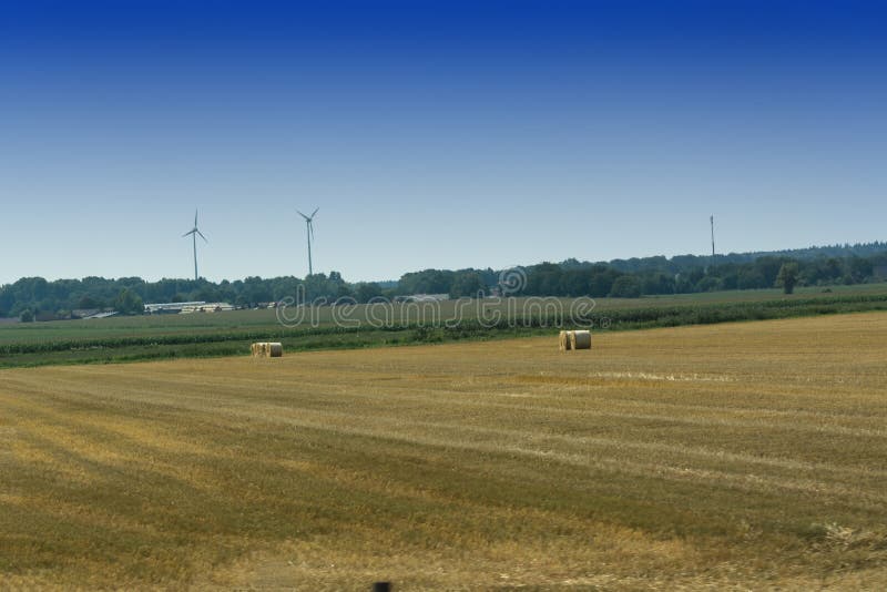 Big hay bales on a field stock photo. Image of grain - 164718712