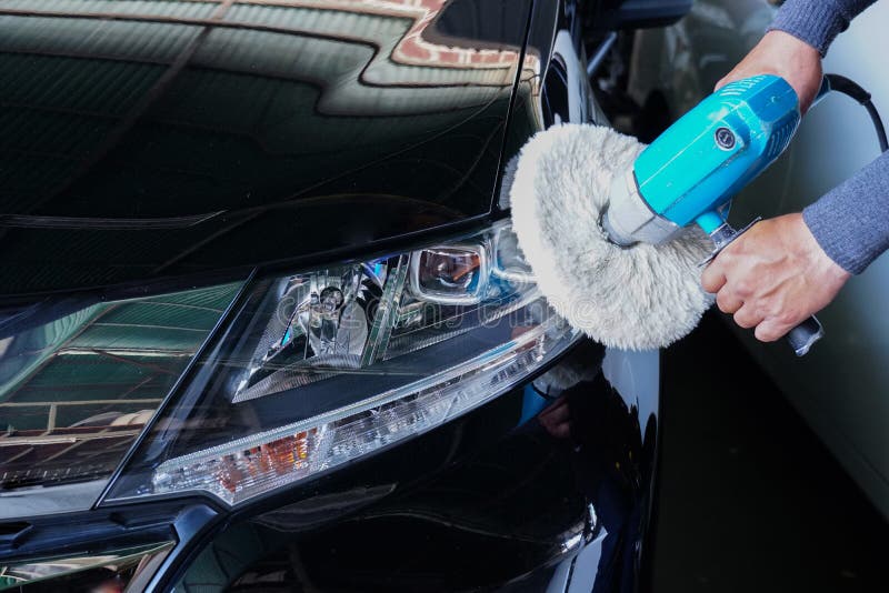 Car Headlights with Power Buffer Machine at Service Station - a Stock ...