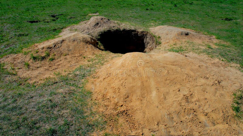 Big Hole In Grass Royalty Free Stock Image - Image: 3948826