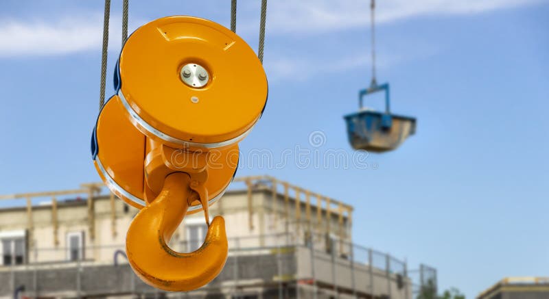Big Hook in Front of a Blue Container with Building Materials Floats ...