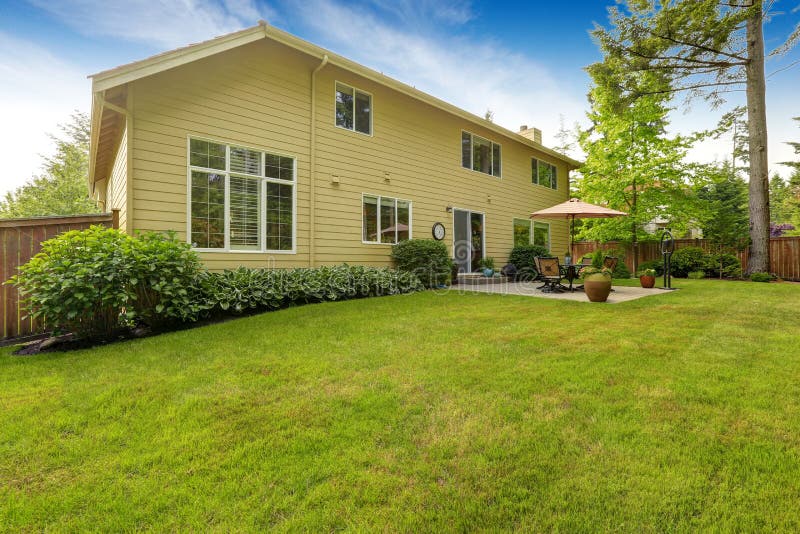 Big House with Backyard Patio Stock Photo - Image of house, landscape ...