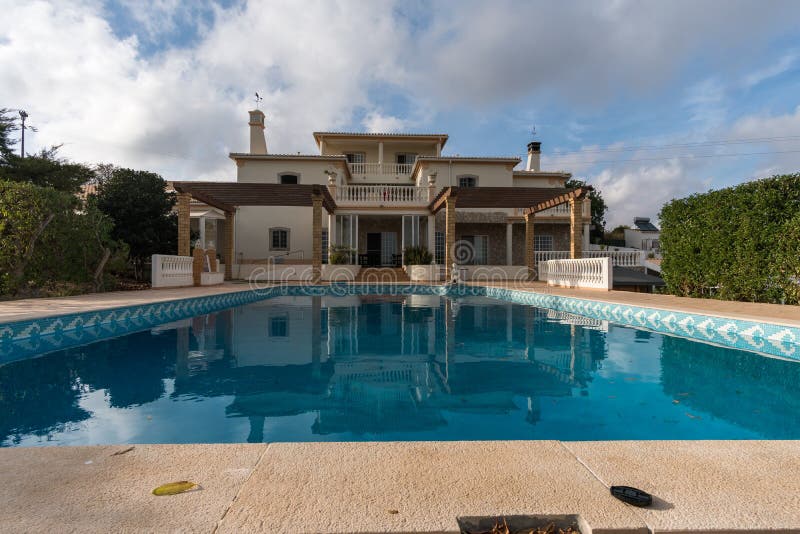 Big House with Swimming Pool in a Cloudy Day Editorial Photo - Image of ...