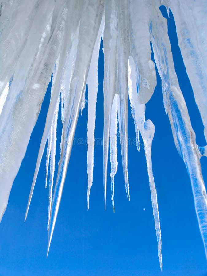 Big Icicles on Blue Sky Background Stock Image - Image of melt ...