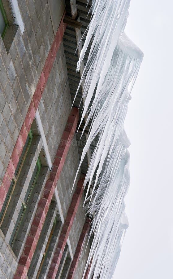Big Icicles Hanging on Roof Stock Image - Image of frosty, windows ...
