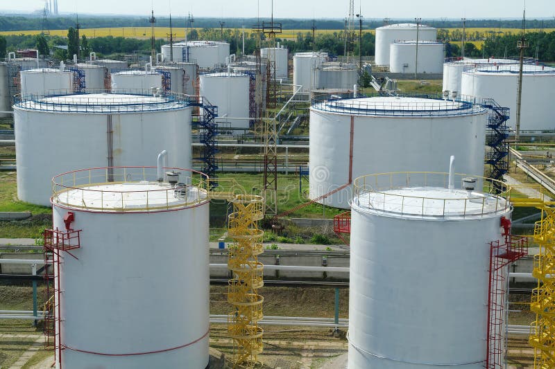 Big Industrial Oil Tanks in a Refinery Base Stock Photo - Image of ...