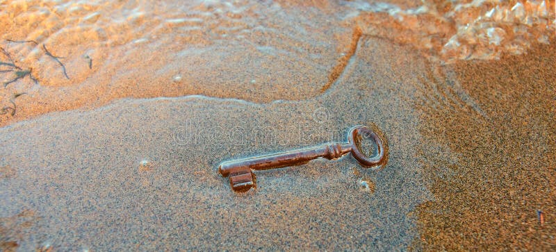The Big Iron Key To the Treasure Chest Washed Up on the Sandy Beach ...