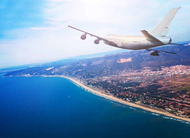 Big Jet Airplane Fly Over Mediterranean Coast Stock Photo - Image of ...