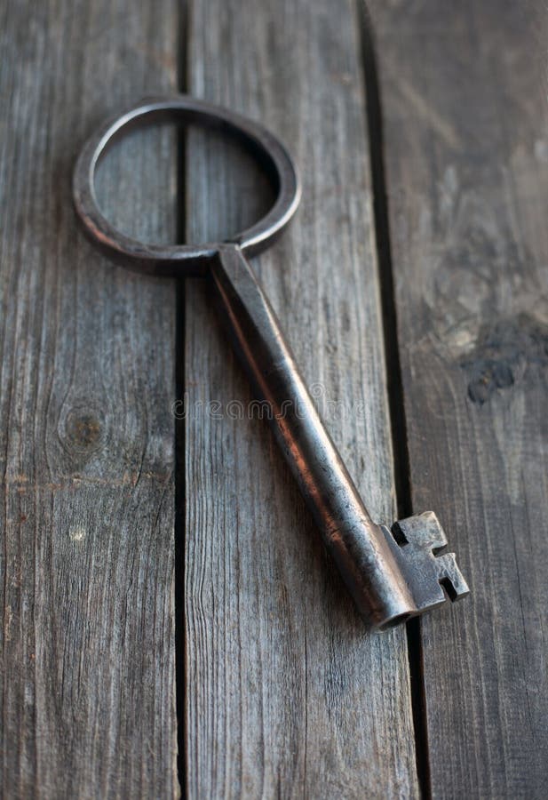 Big Key on Wooden Rustic Table Stock Photo - Image of object, retro ...