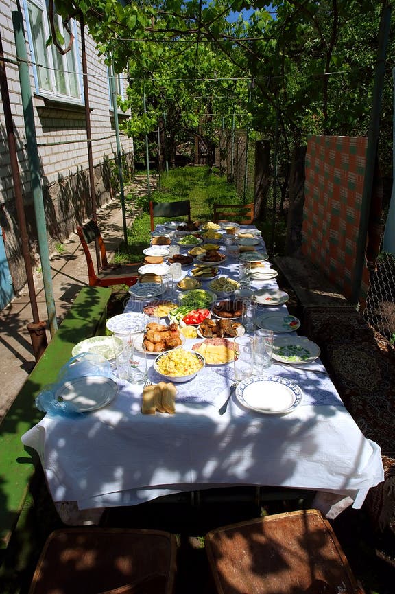 Big lunch table in shadow stock photo. Image of outdoors - 2700488