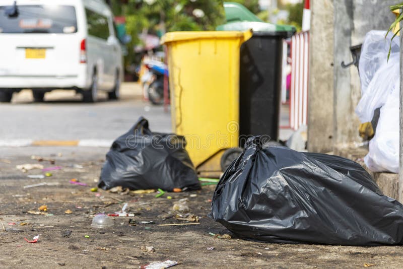 Sitting Beside The Garbage. Stock Photo - Image of messy, garbage: 16636808