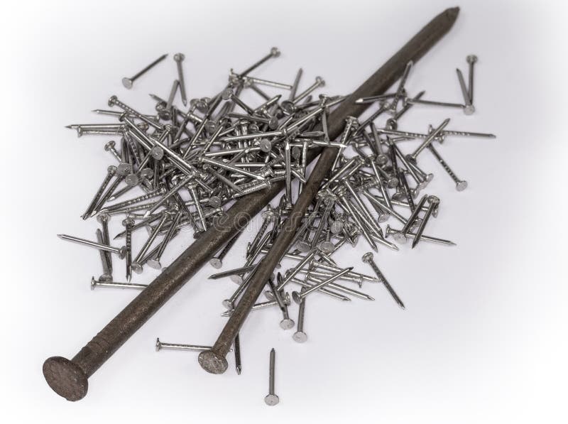 Big and Medium Nails among a Pile of Small Nails Stock Photo - Image of ...