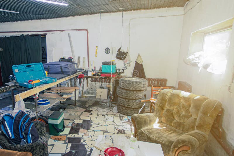 Big Mess in an Over Stuffed Suburban Garage Stock Image - Image of ...
