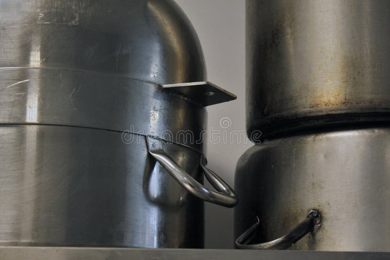 Big Metal Pots on a Shelf Upside Down Stock Image - Image of stainless ...