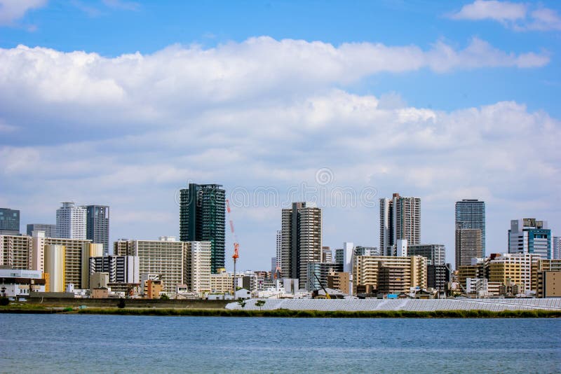 A Big Modern City Across the River Stock Photo - Image of side, river ...
