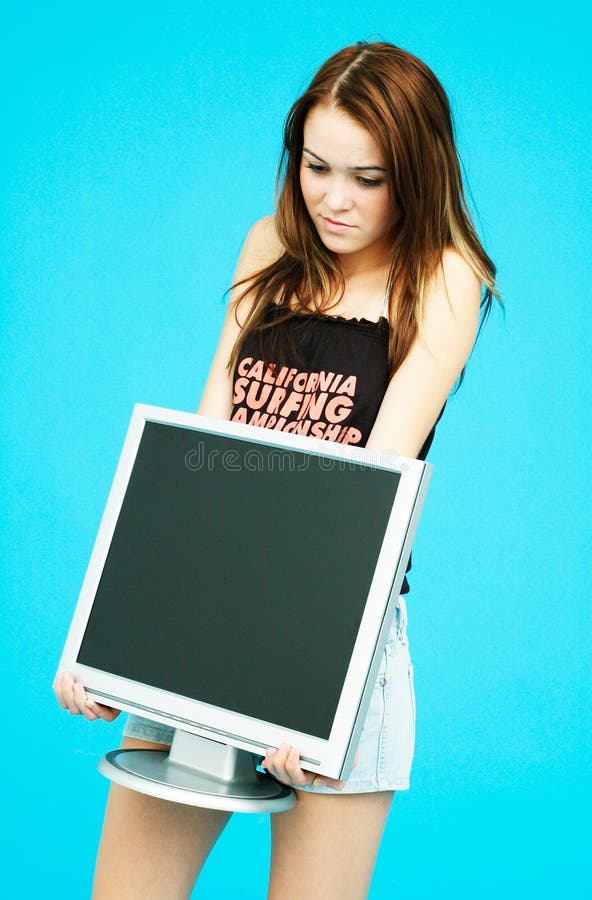 Big monitor - small girl. stock photo. Image of squeeze - 1446562