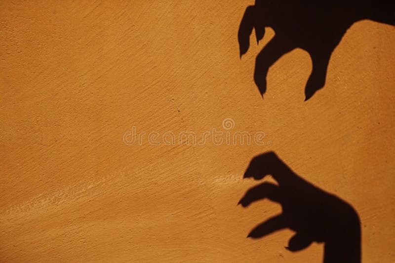 A Big Monster Claw Shadow Hallowween Concept on Wall. Stock Photo ...