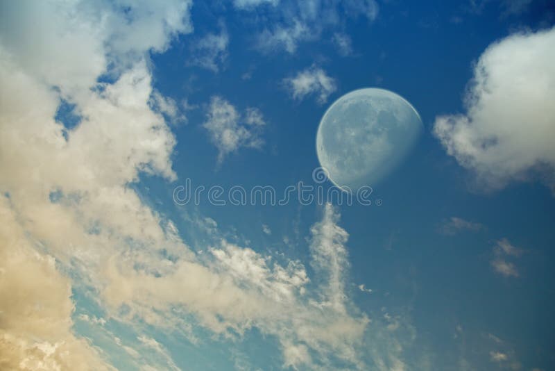 Moon in the Evening, with Clouds Beneath it Stock Image - Image of ...