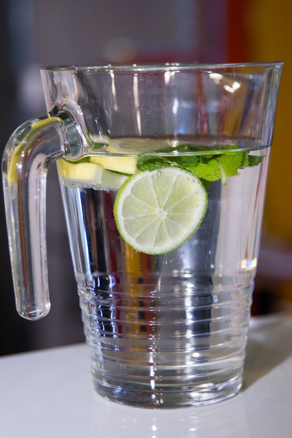 Big Mug of Fresh Water with Lemon Stock Photo - Image of drinking, blue ...