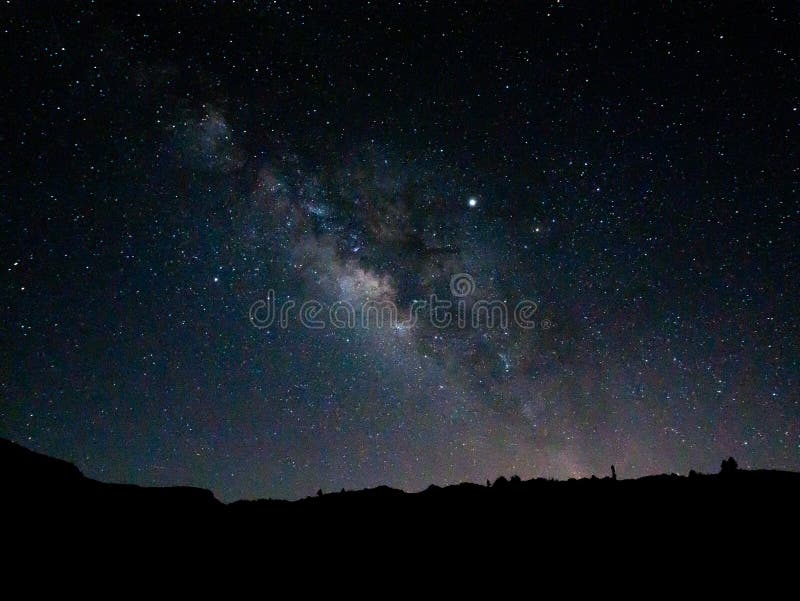Big Night Scene of the Milky Way Over the Mountains Stock Image - Image ...