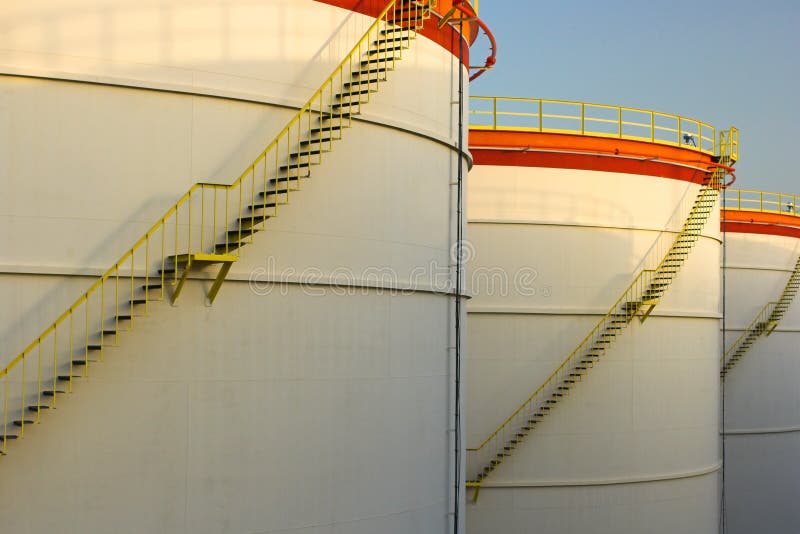 Big oil tanks in a row stock image. Image of light, petrol - 3274713