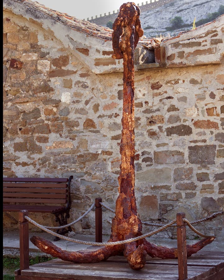Big Old Rusty Anchor on a Wooden Stand Stock Photo - Image of anchor ...