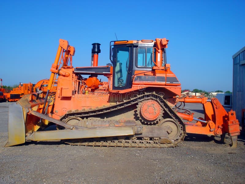 Orange bulldozer stock photo. Image of blue, dirt, excavation - 55356058