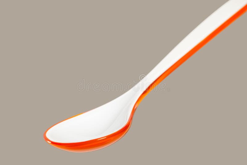 Big orange plastic spoon stock photo. Image of home, spoon - 63484468