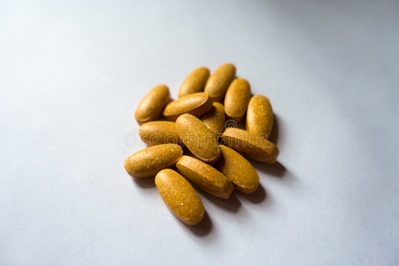 Big Orange Tablets of Multivitamin Complex Stock Photo - Image of ...