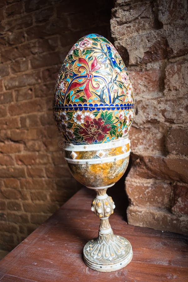 Big Painted Egg in a Stand on a Background of Red Brick Stock Image ...