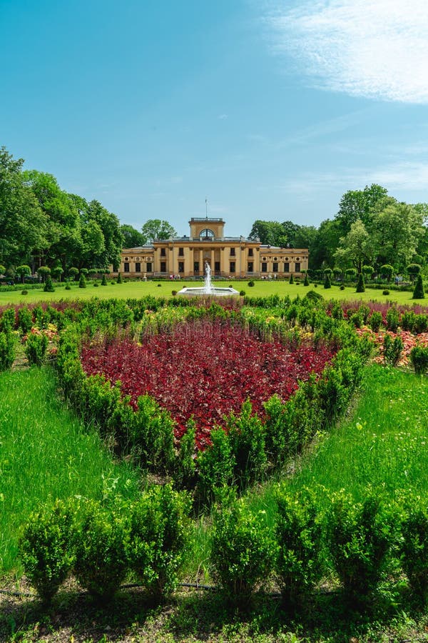 Big Palace with a Pathway Full of Trees and Plants Stock Photo - Image ...