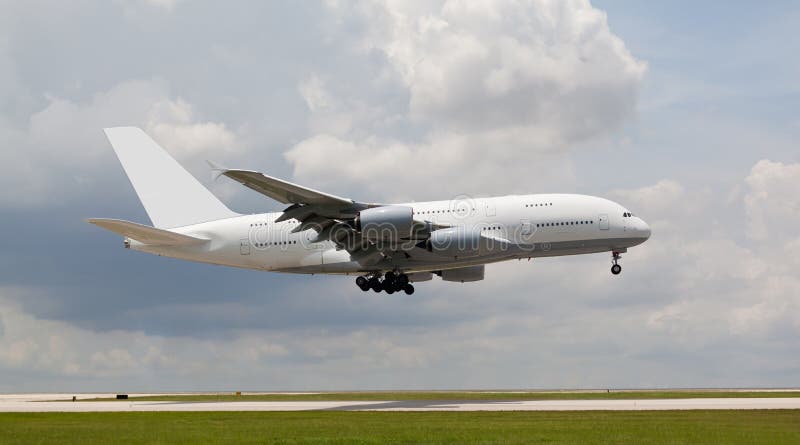 Big passenger jet landing stock image. Image of flight - 63462463