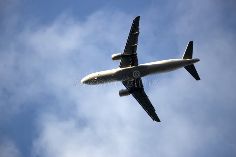 Big Passenger Plane in the Sky. View from the Bottom Stock Image ...