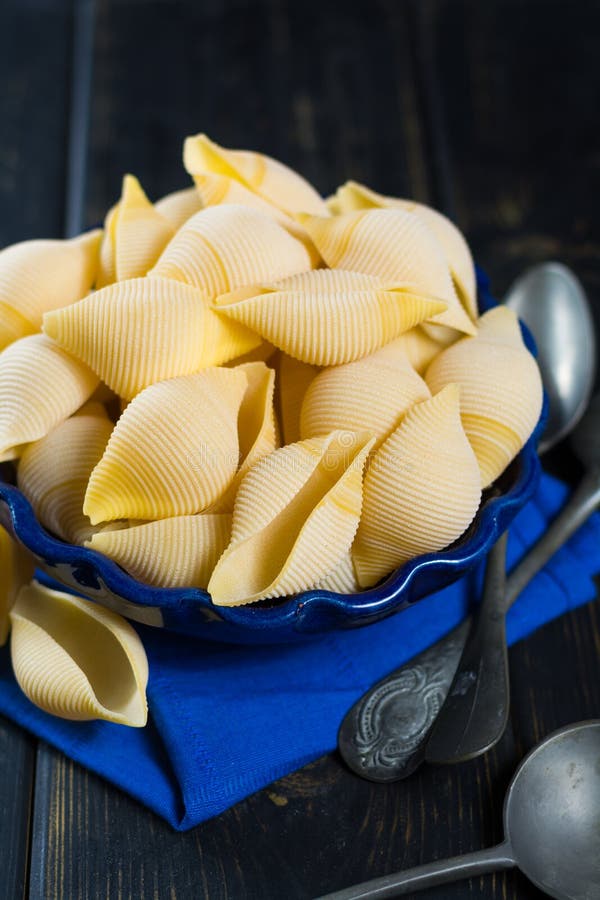 Big Pasta Shells for Stuffing, Uncooked Stock Photo - Image of wood ...