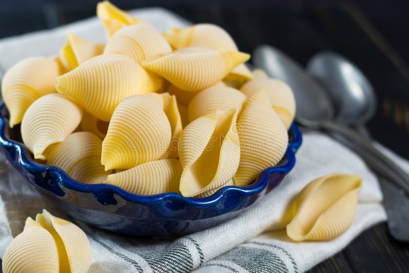 Big Pasta Shells for Stuffing, Uncooked Stock Photo - Image of table ...
