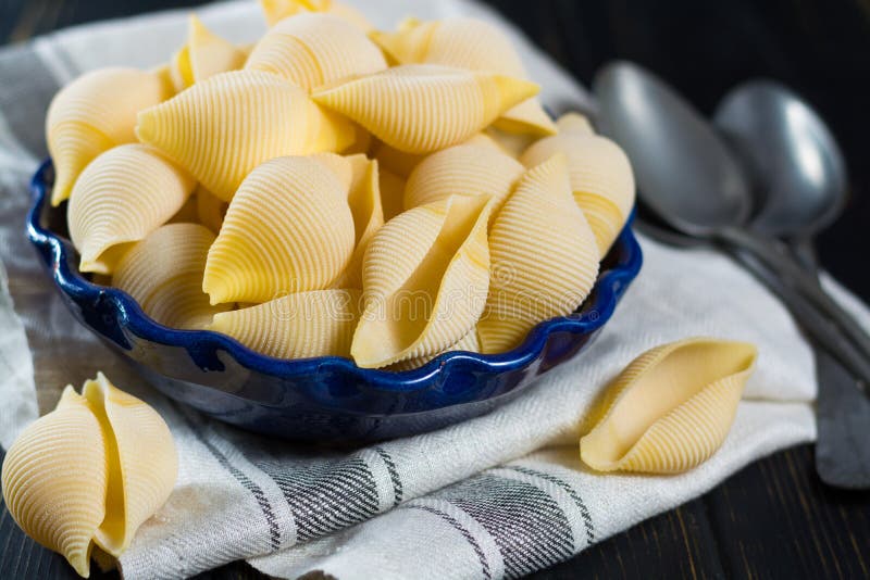 Big Pasta Shells for Stuffing, Uncooked Stock Photo - Image of wood ...