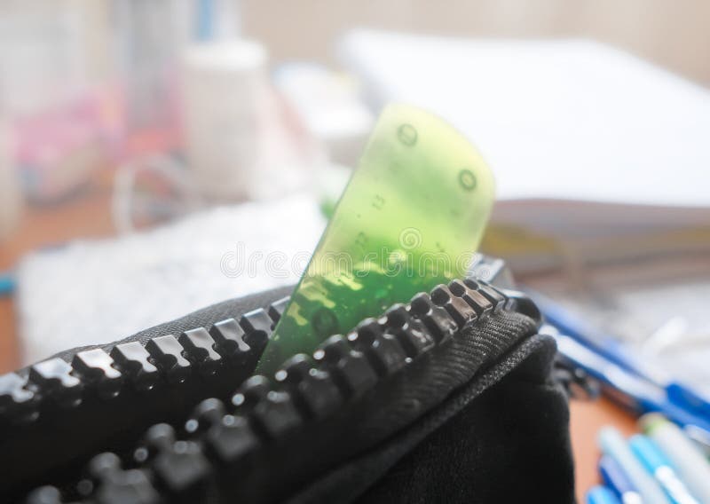Big Pencil Case with Ruler on the Table. Blurred Photo Stock Photo ...